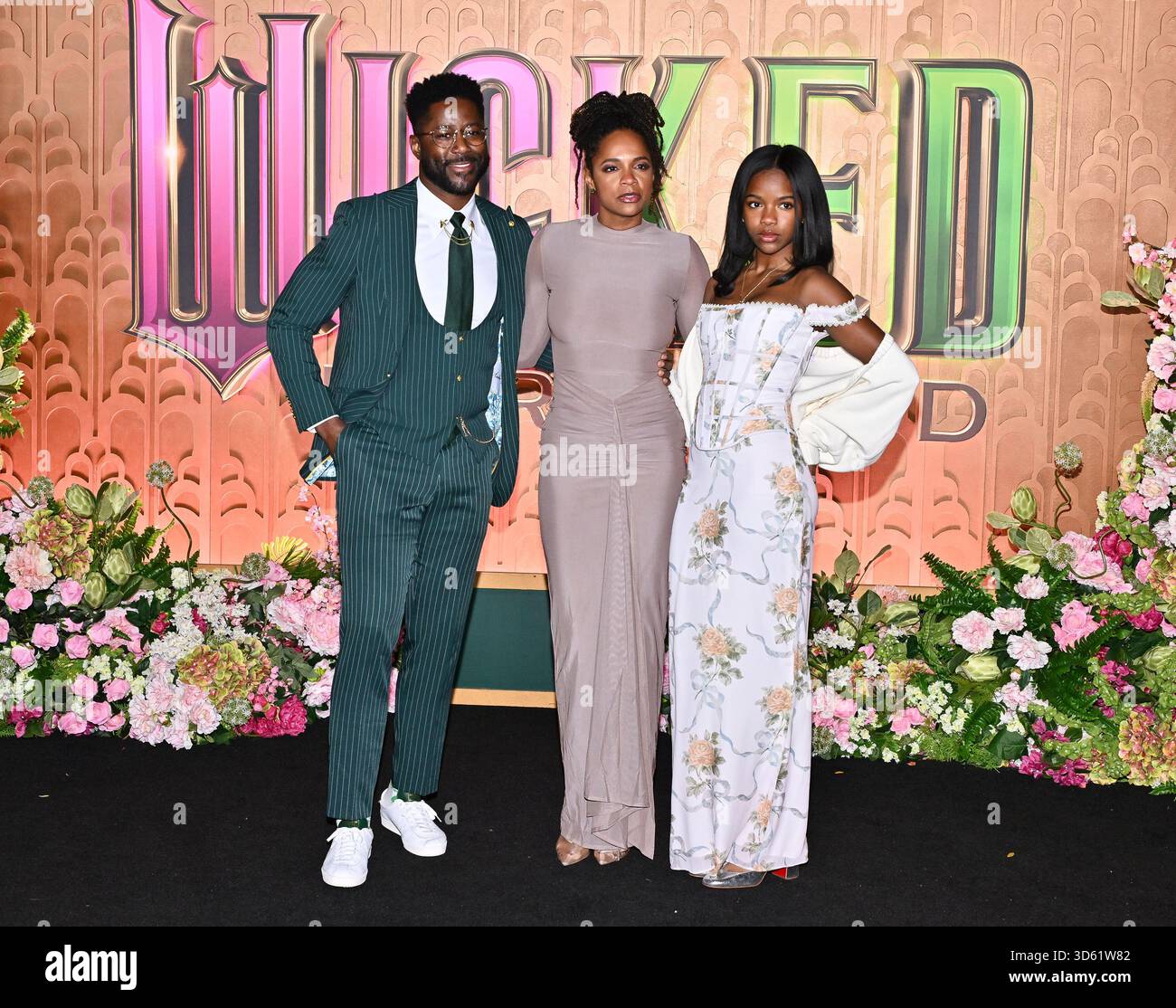 Nate Burleson, left, Atoya Burleson and Mia Pearl Burleson attend the ...