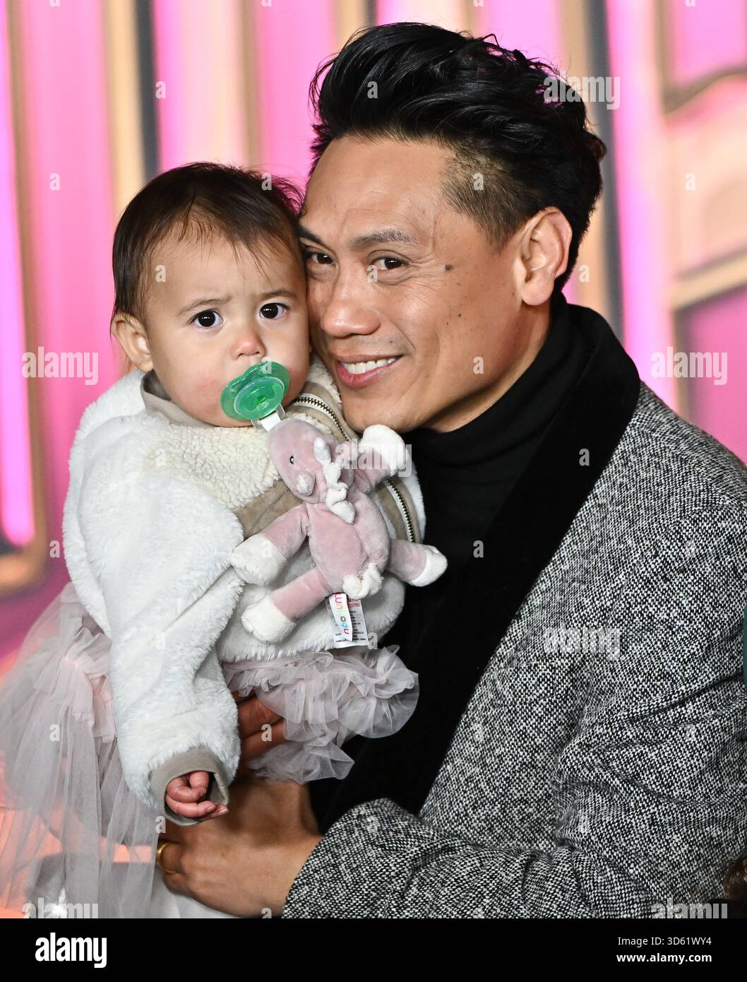 Jon M. Chu and daughter attend the premiere of "Wicked: For Good" at ...