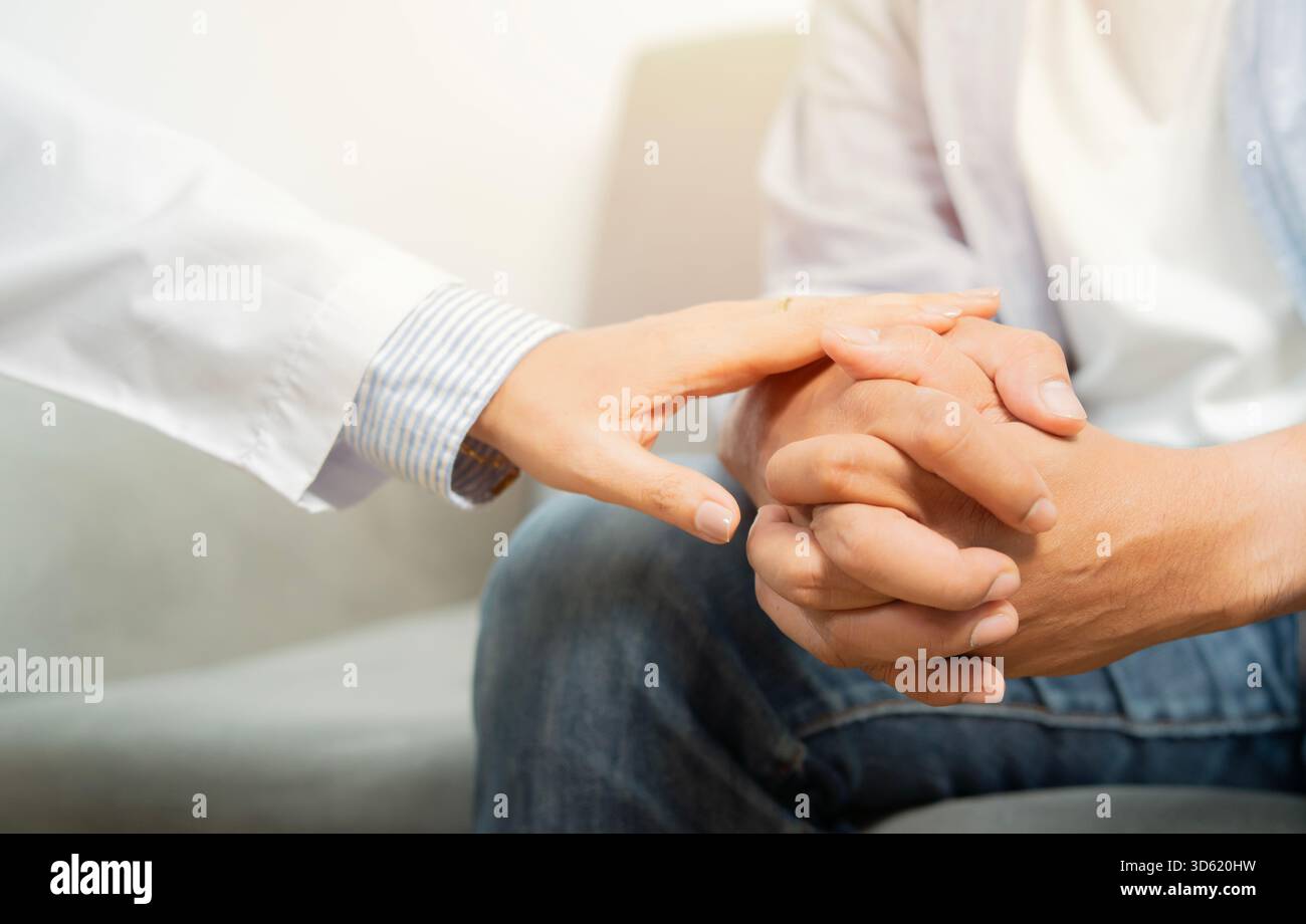 Caregiver, doctor holding hand of her patient and showing kindness ...