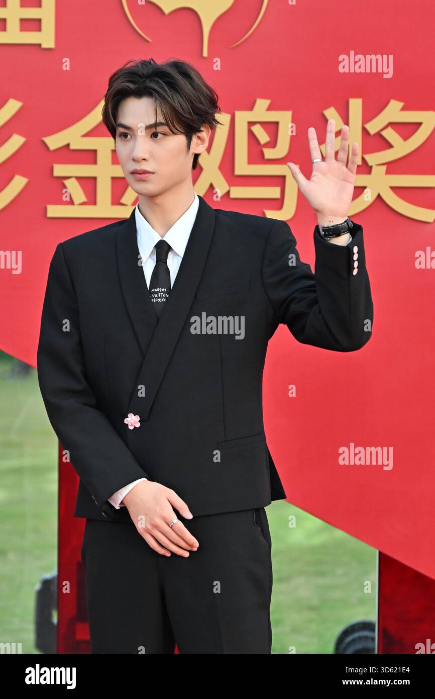 Chinese singer, dancer, rapper, actor and host Huang Minghao poses for ...