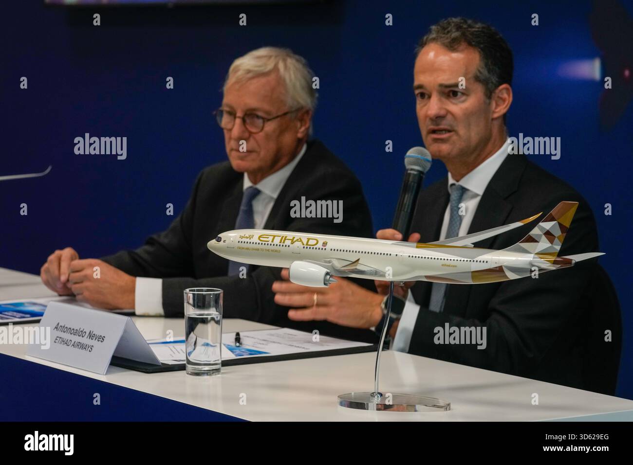 A model of Airbus A350 sits on the table as Etihad Airways CEO ...