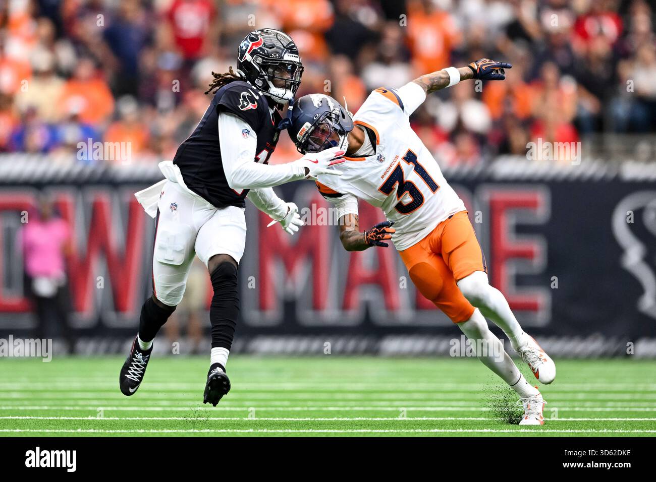 Houston Texans cornerback Tremon Smith (11) runs down field as Denver ...