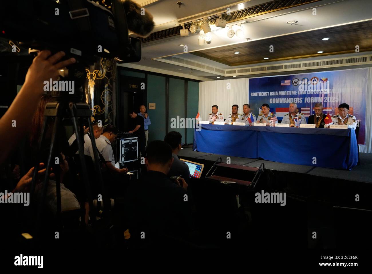 On the dais from left, Colonel Asep Budiman, head of the Command and ...
