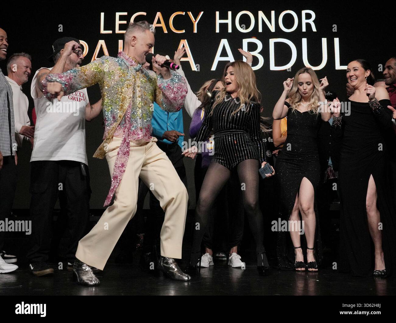 Kevin Stea dancing with Paula Abdul on stage at the 15th Annual World ...