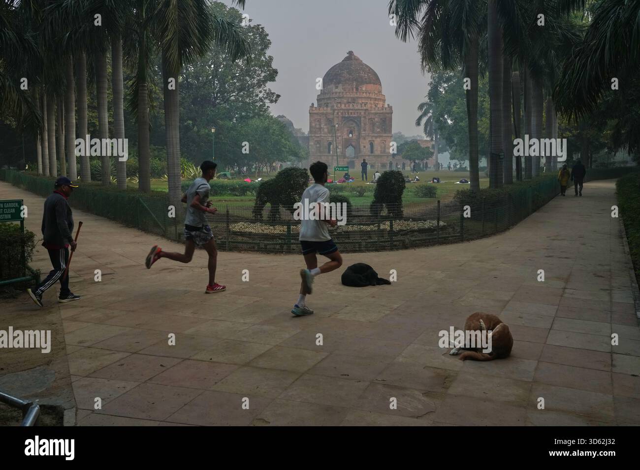 People jog early morning amidst smog in New Delhi, India, Tuesday, Nov ...