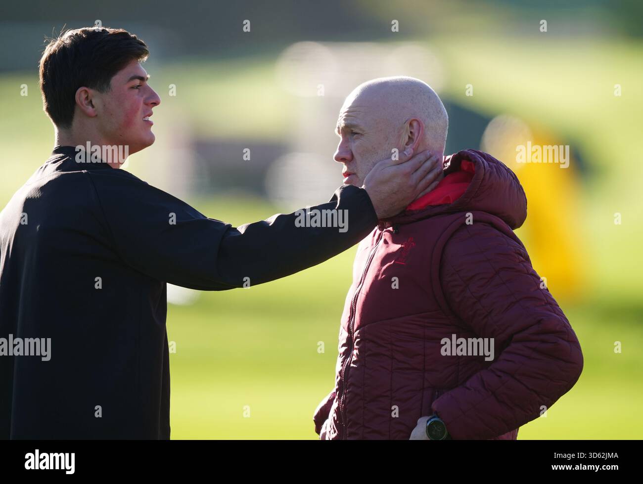 Wales head coach Steve Tandy speaks to Louis Rees-Zammit during a ...