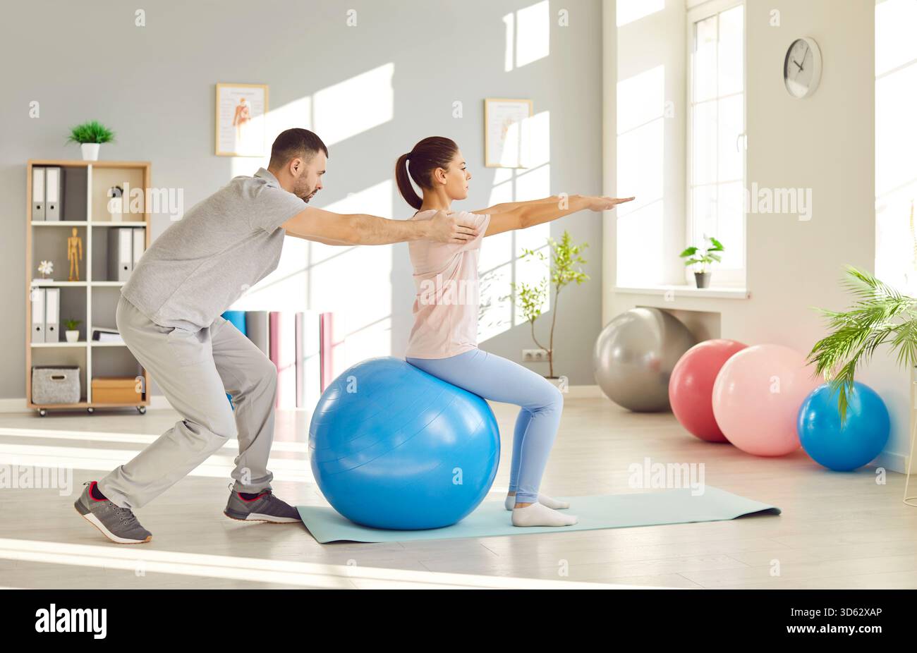 Rehabilitation, corrective balance ball exercise for flexibility ...