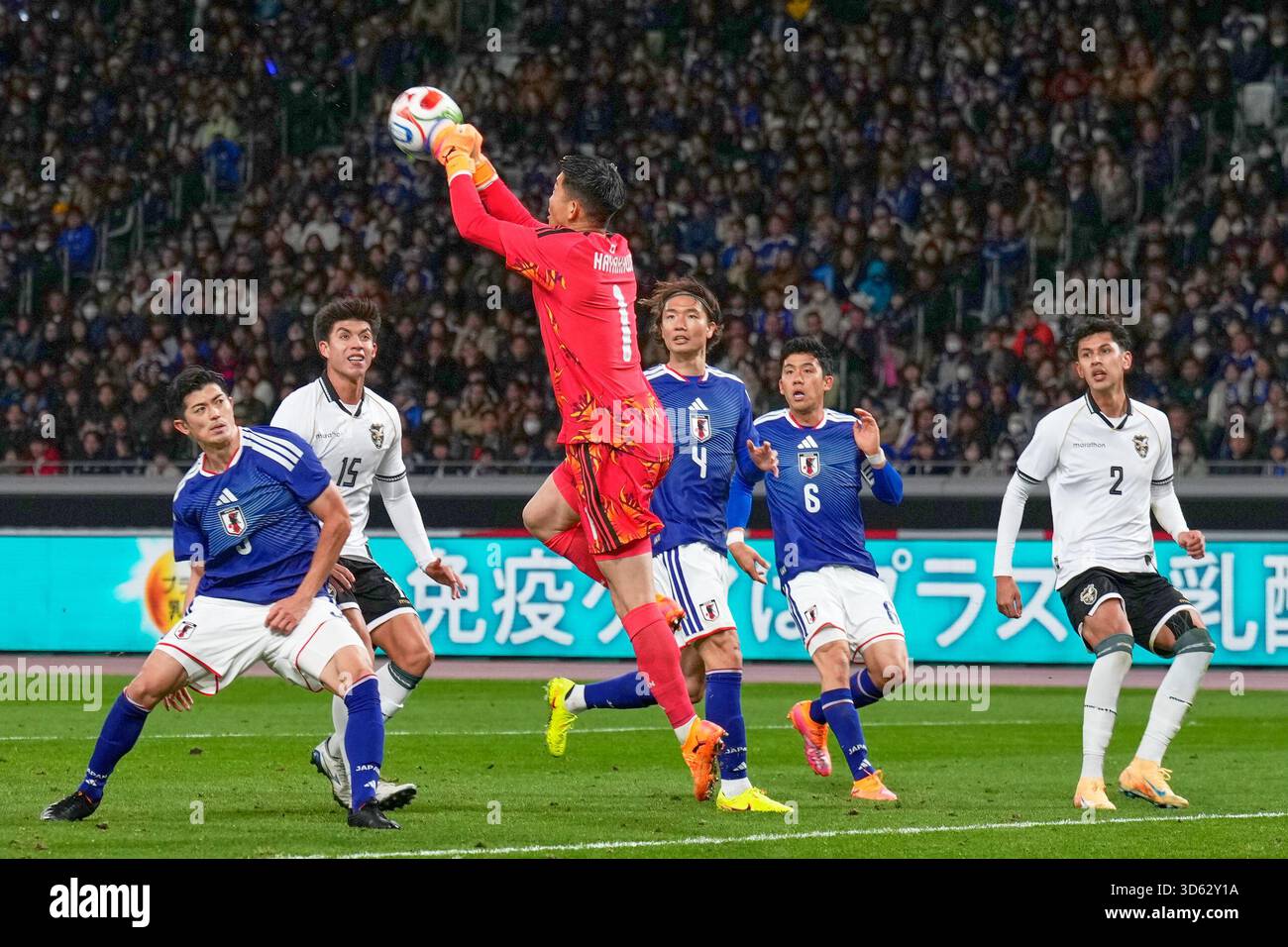 Japan's goalkeeper Tomoki Hayakawa saves the ball during the ...