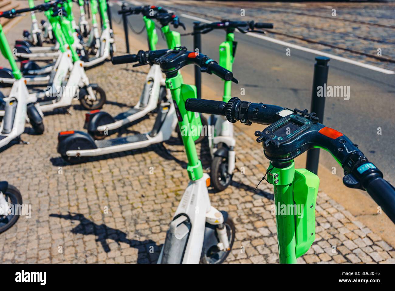 Row green electric scooters parked hi-res stock photography and images ...
