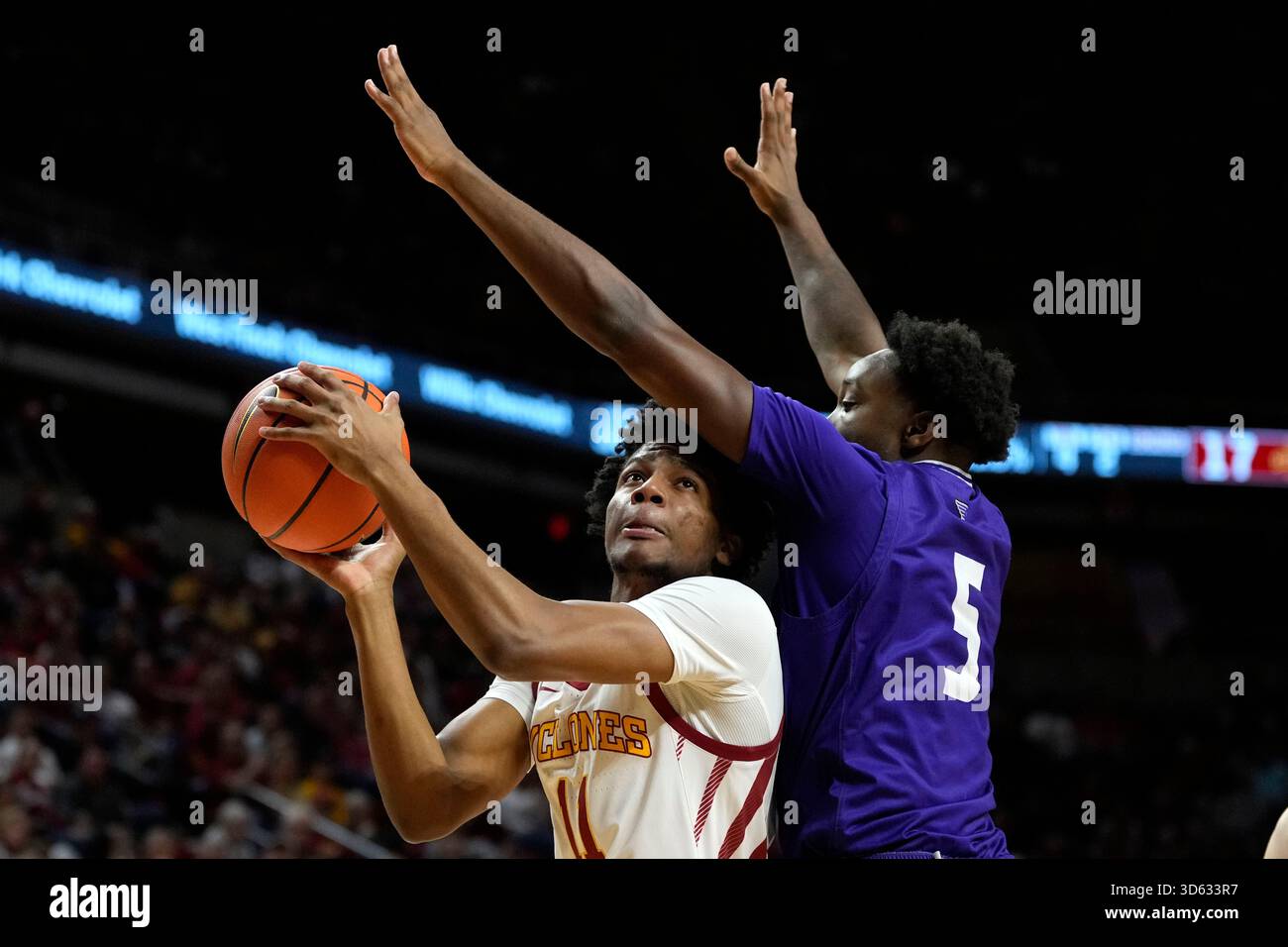 Iowa State guard Dominick Nelson (11) drives around Stonehill guard ...