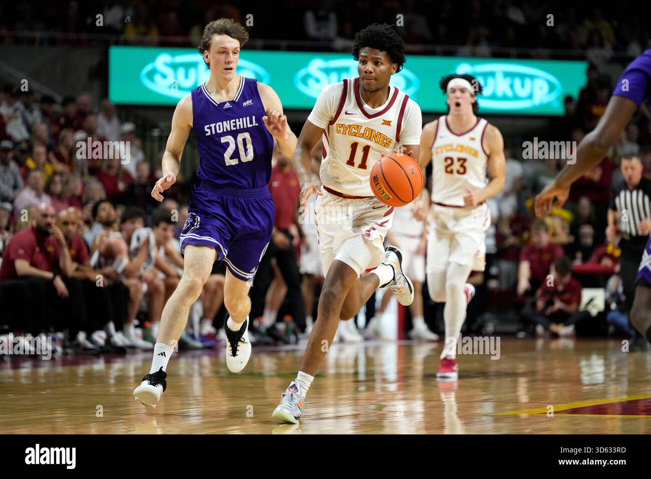 Iowa State guard Dominick Nelson (11) drives up court past Stonehill ...