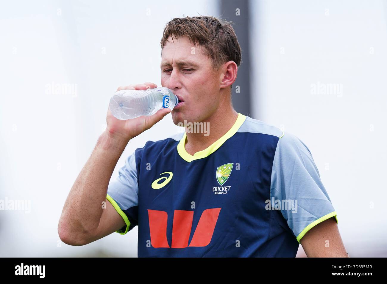 Australia's Marnus Labuschagne drinks water during a nets session at ...