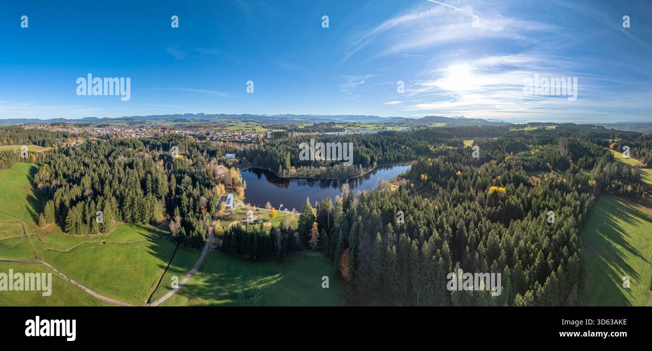 Aerial photo at sunset of the city of Lindenberg with lake Waldsee in ...