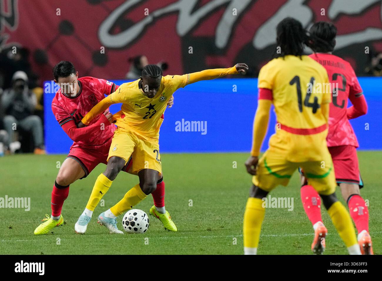 Ghana's Kamaldeen Sulemana fights for the ball against South Korea's ...