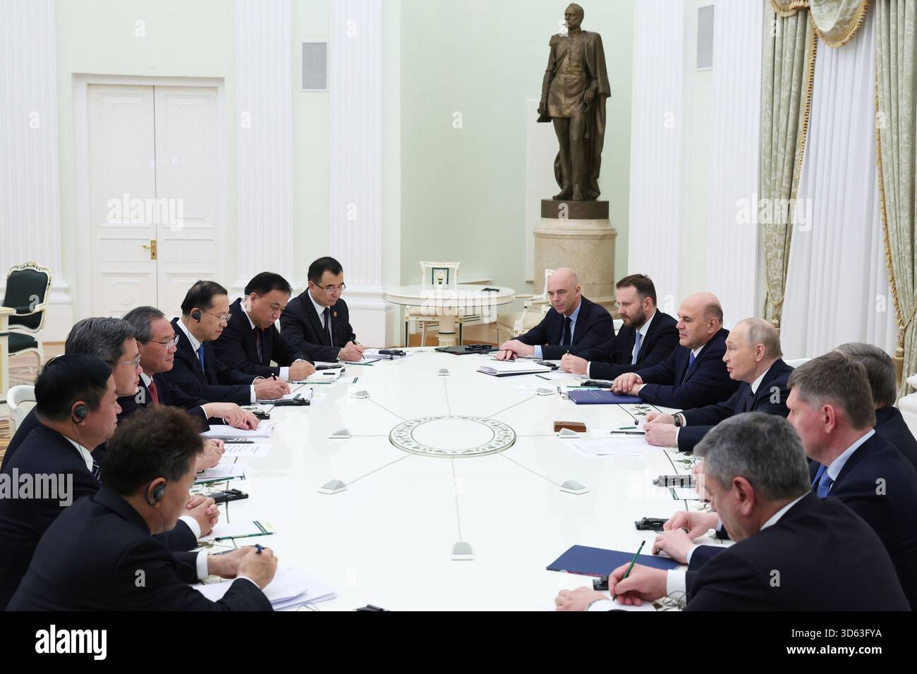 Russian President Vladimir Putin, third right, speaks with Chinese ...