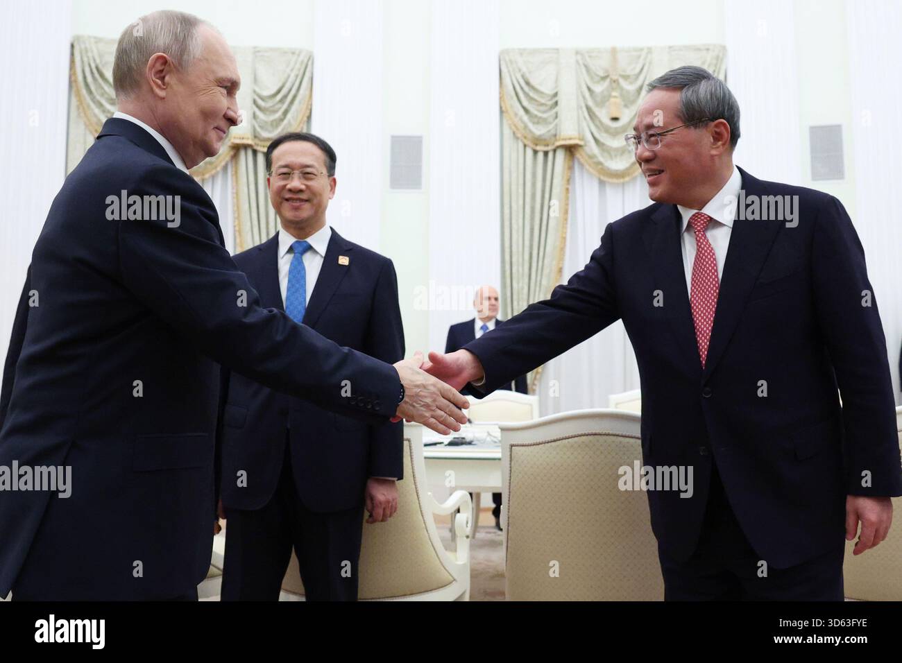 Russian President Vladimir Putin, left, and Chinese Premier Li Qiang ...