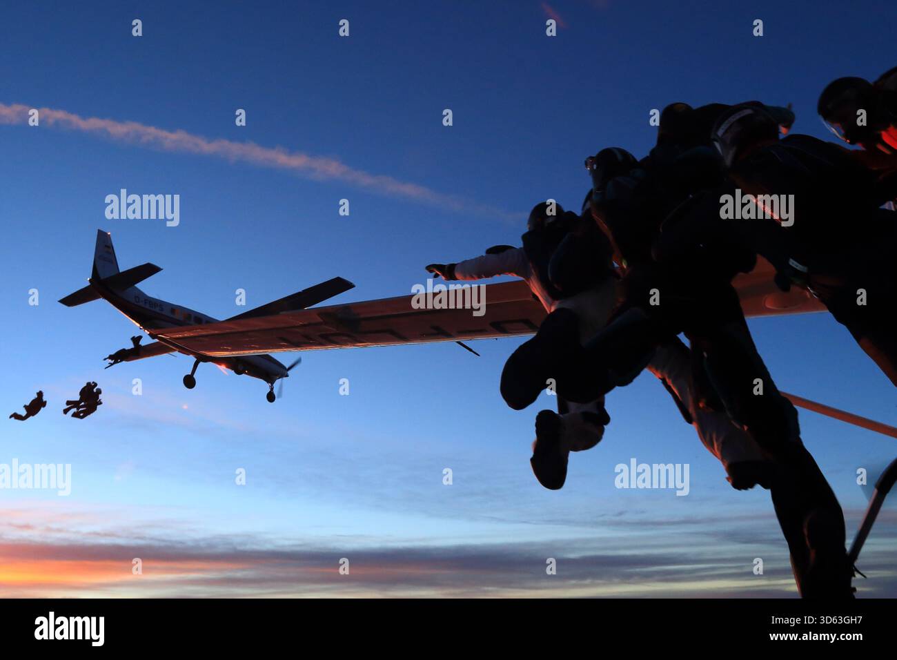 Skydive exit from Cessna Caravan Stock Photo - Alamy