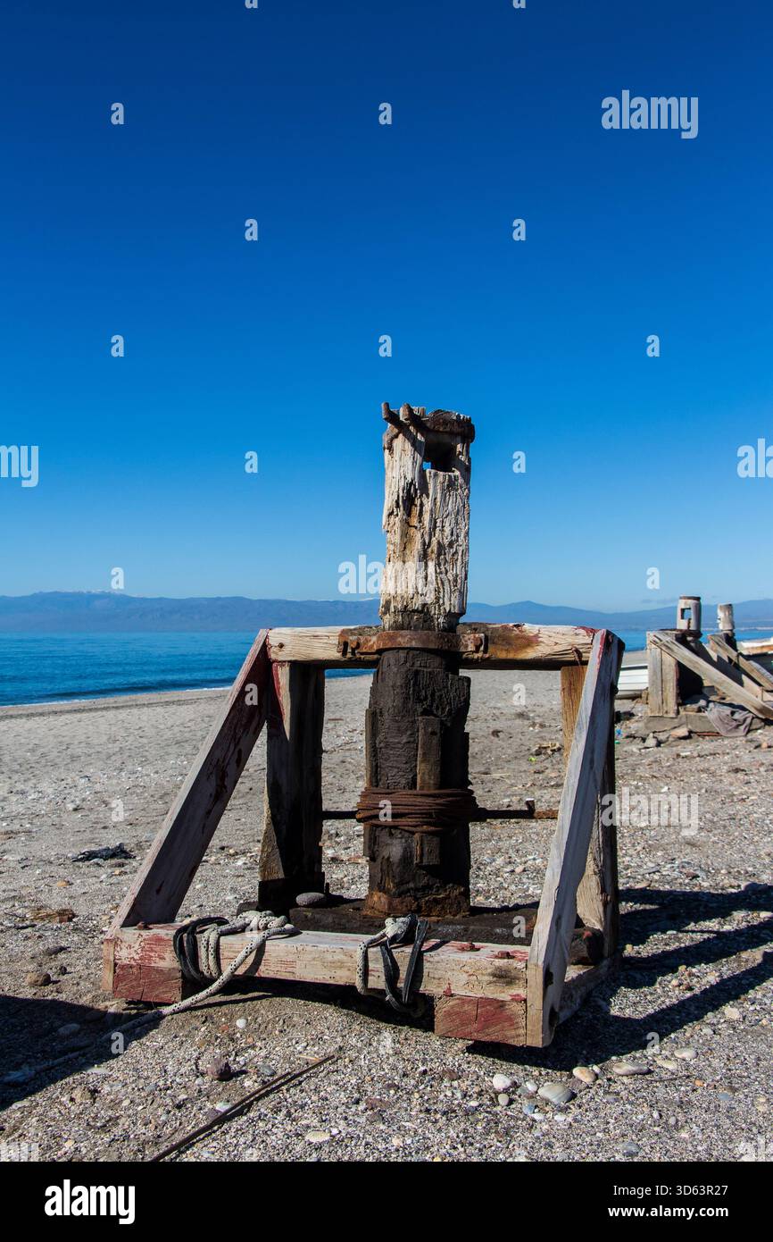 old wooden winch to drag boats, wooden winch with steel cable to drag ...
