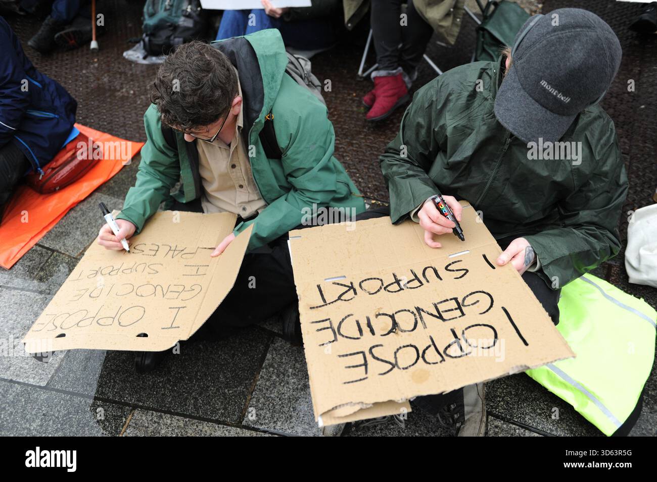 EDINBURGH, SCOTLAND: November 18, 2025 - Protesters seen sitting down ...