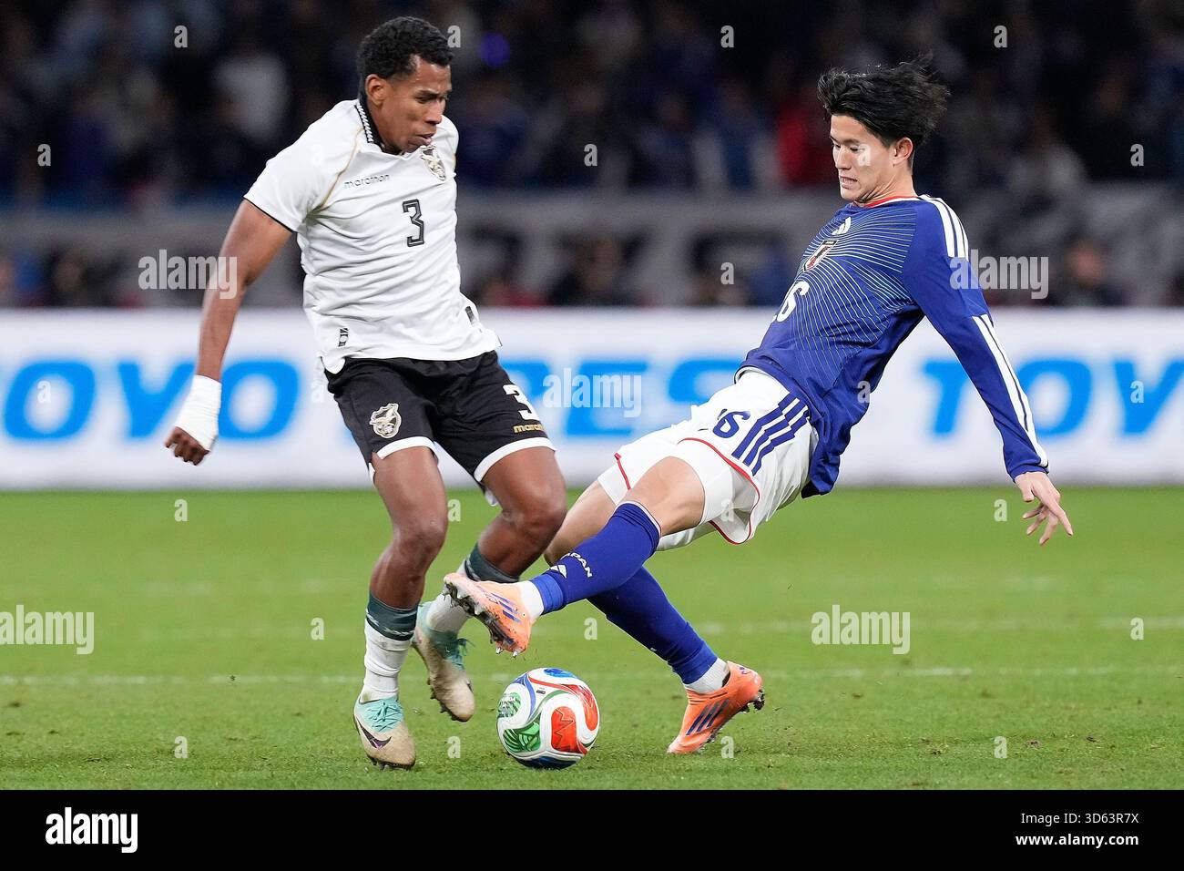 Bolivia's Diego Medina, left, and Japan's Keisuke Goto, right, fight ...