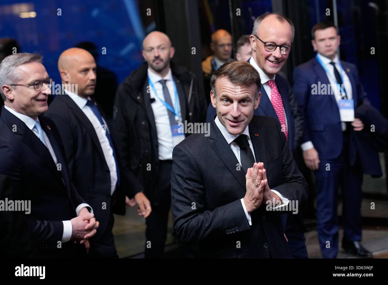 German Chancellor Friedrich Merz, center right, welcomes French ...
