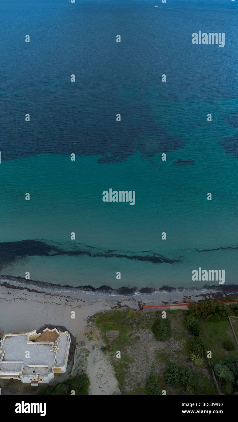 Aerial coastal view of Sotto Torre beach with turquoise water in ...