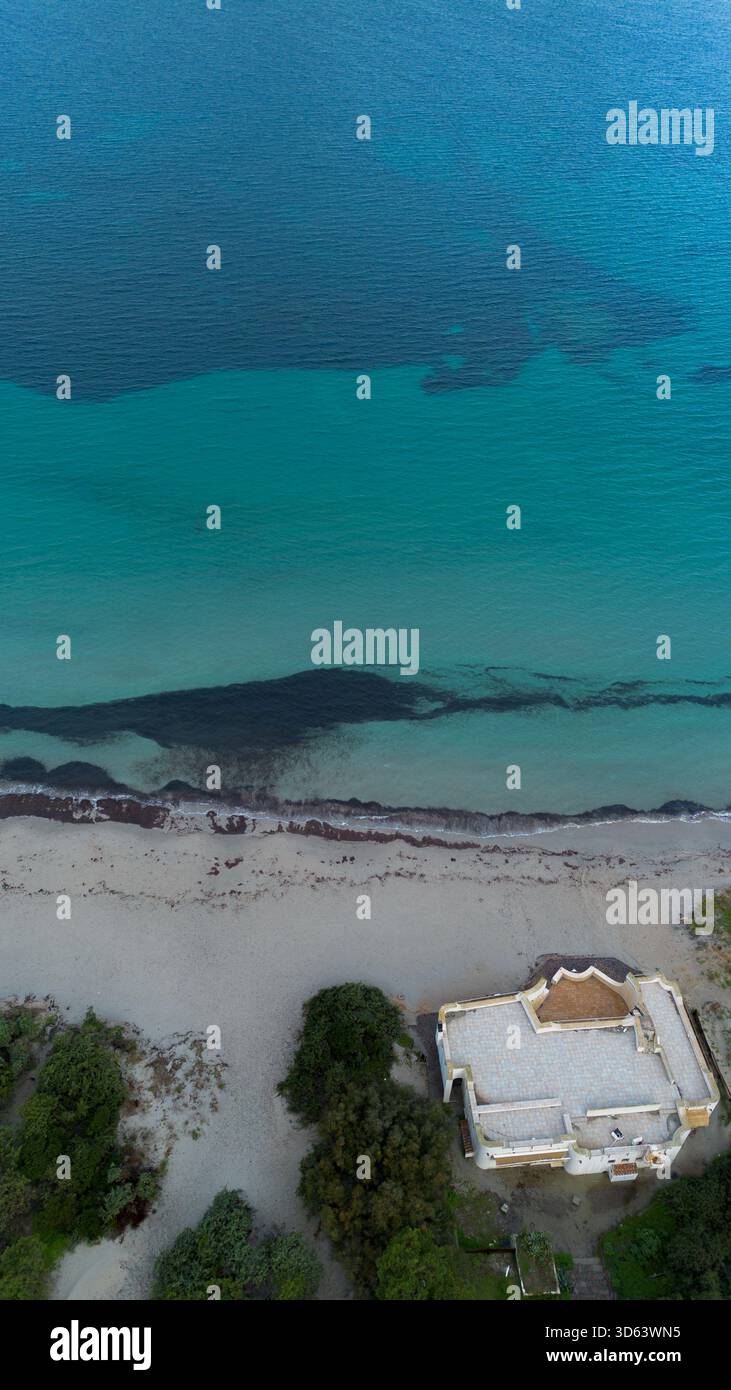 Aerial coastal view of Sotto Torre beach with turquoise water in ...