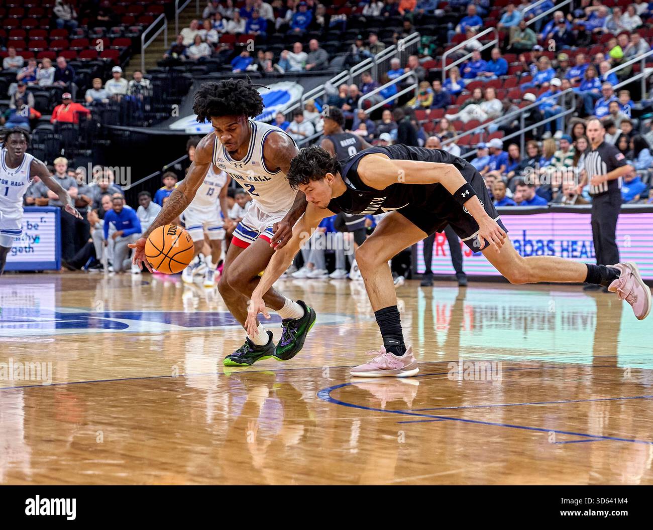 Seton Hall Pirates guard TJ Simpkins (2) pressure Monmouth Fighting ...