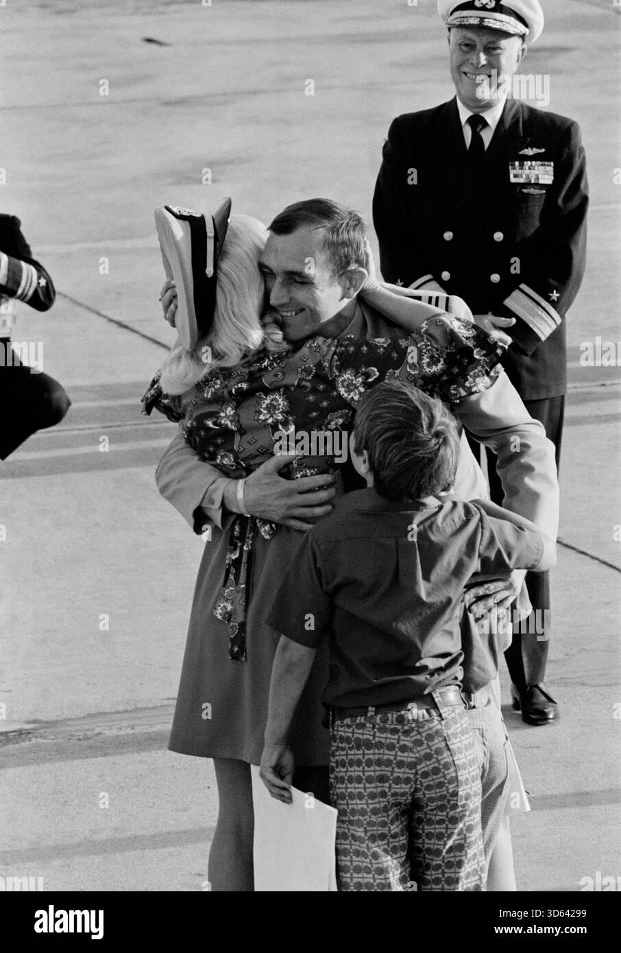 Marlene McGrath hugs her husband, ex-prisoner of war Navy Lt. Cmdr ...