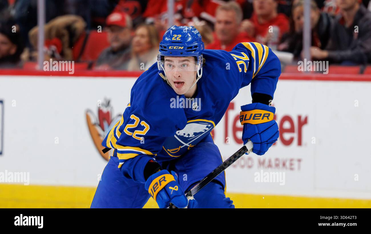 Buffalo Sabres Jack Quinn (22) handles the puck during an NHL hockey ...