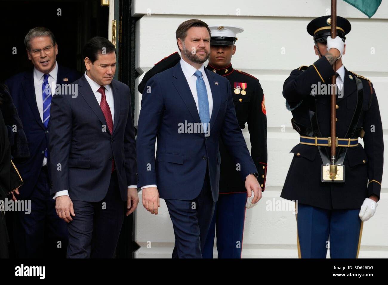 Vice President JD Vance, right, walks with Secretary of State Marco ...