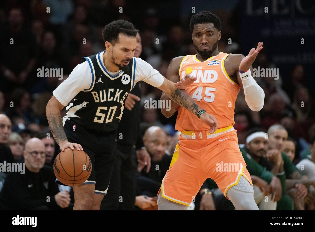 Milwaukee Bucks' Cole Anthony (50) keeps Cleveland Cavaliers' Donovan ...