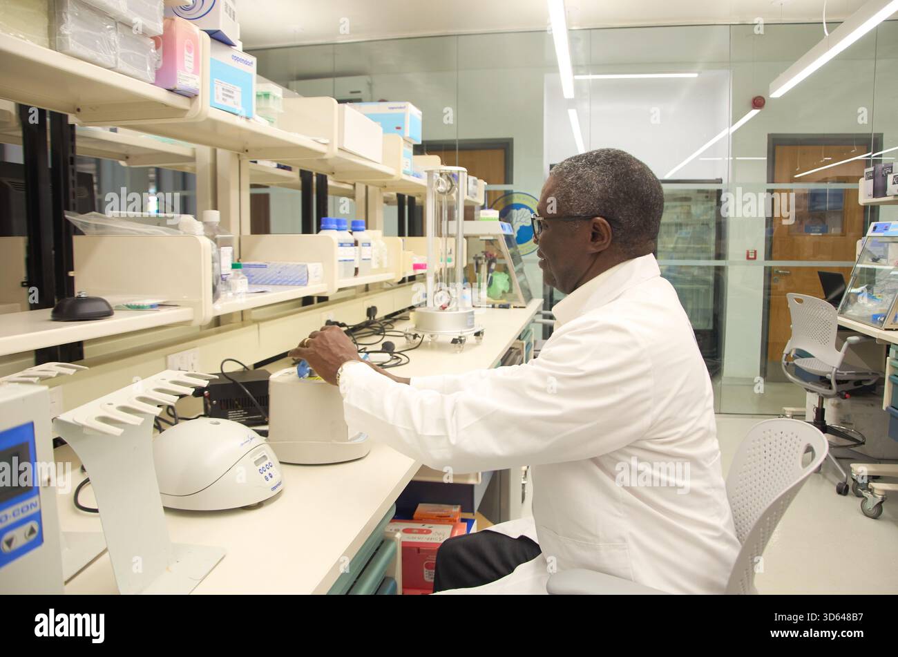 Dr. Christian Happi, sits inside the laboratory at the Institute of ...