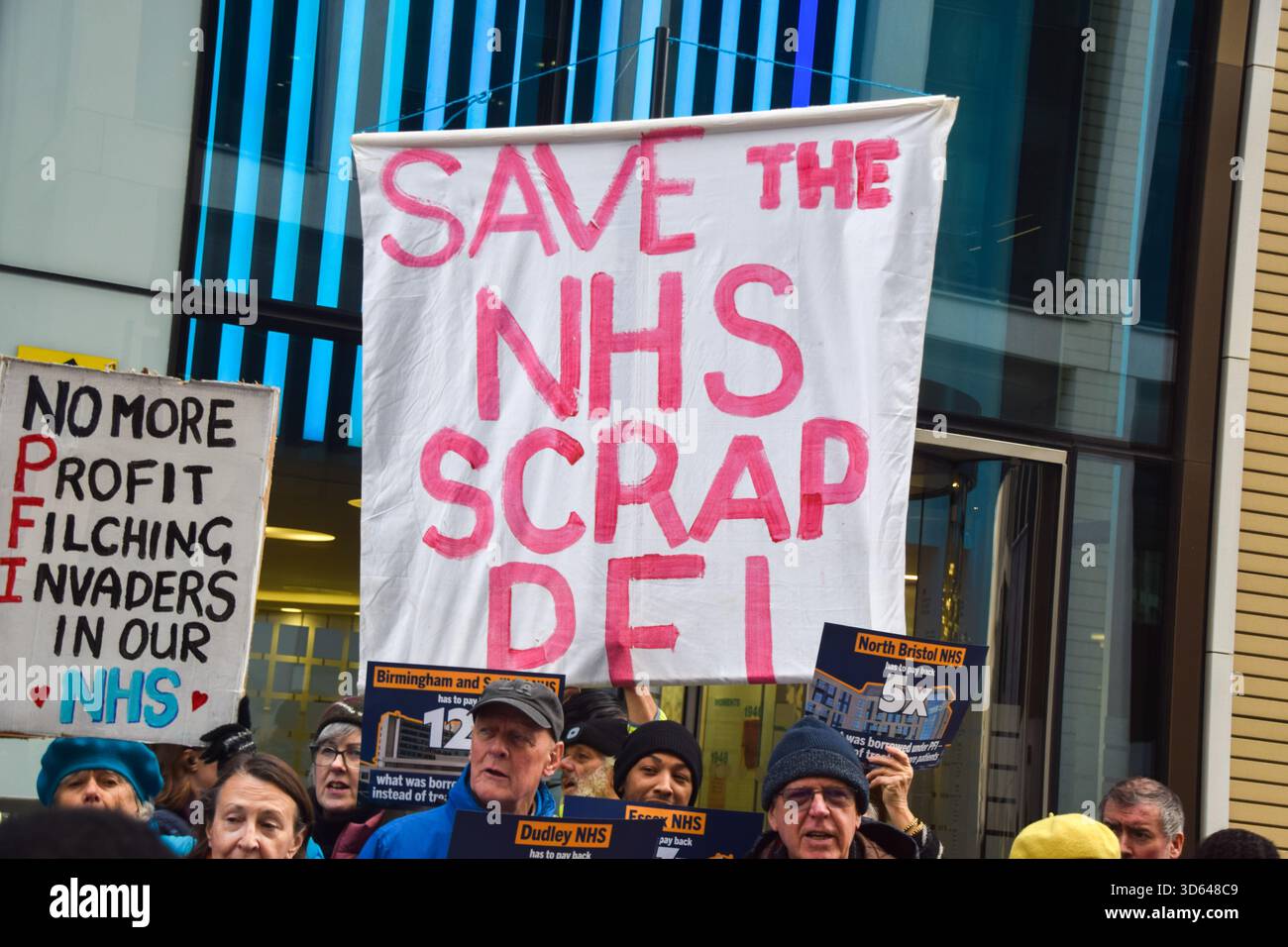 London, UK. 18th November 2025. Campaigners from We Own It stage a ...