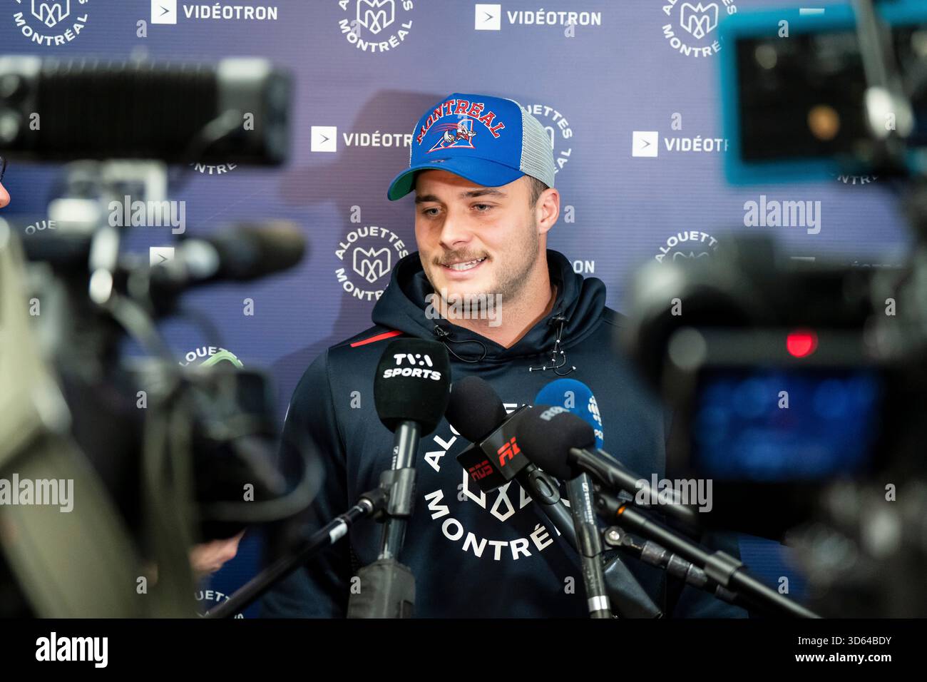 Montreal Alouettes' Alexandre Gagne speaks to reporters during an end ...