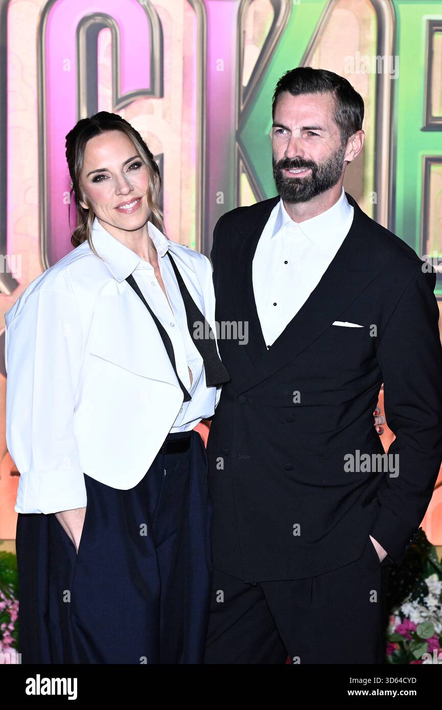 Melanie C and Chris Dingwall walking the red carpet at 'Wicked: For ...