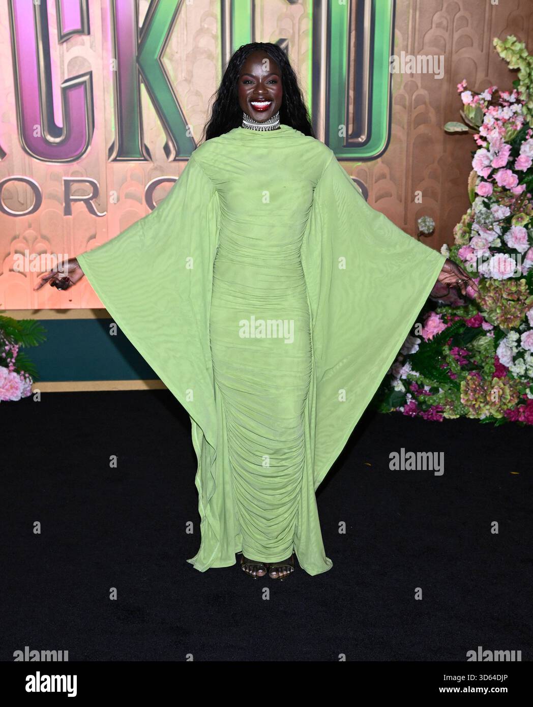 Tunde Oyeneyin walking the red carpet at 'Wicked: For Good!' New York ...