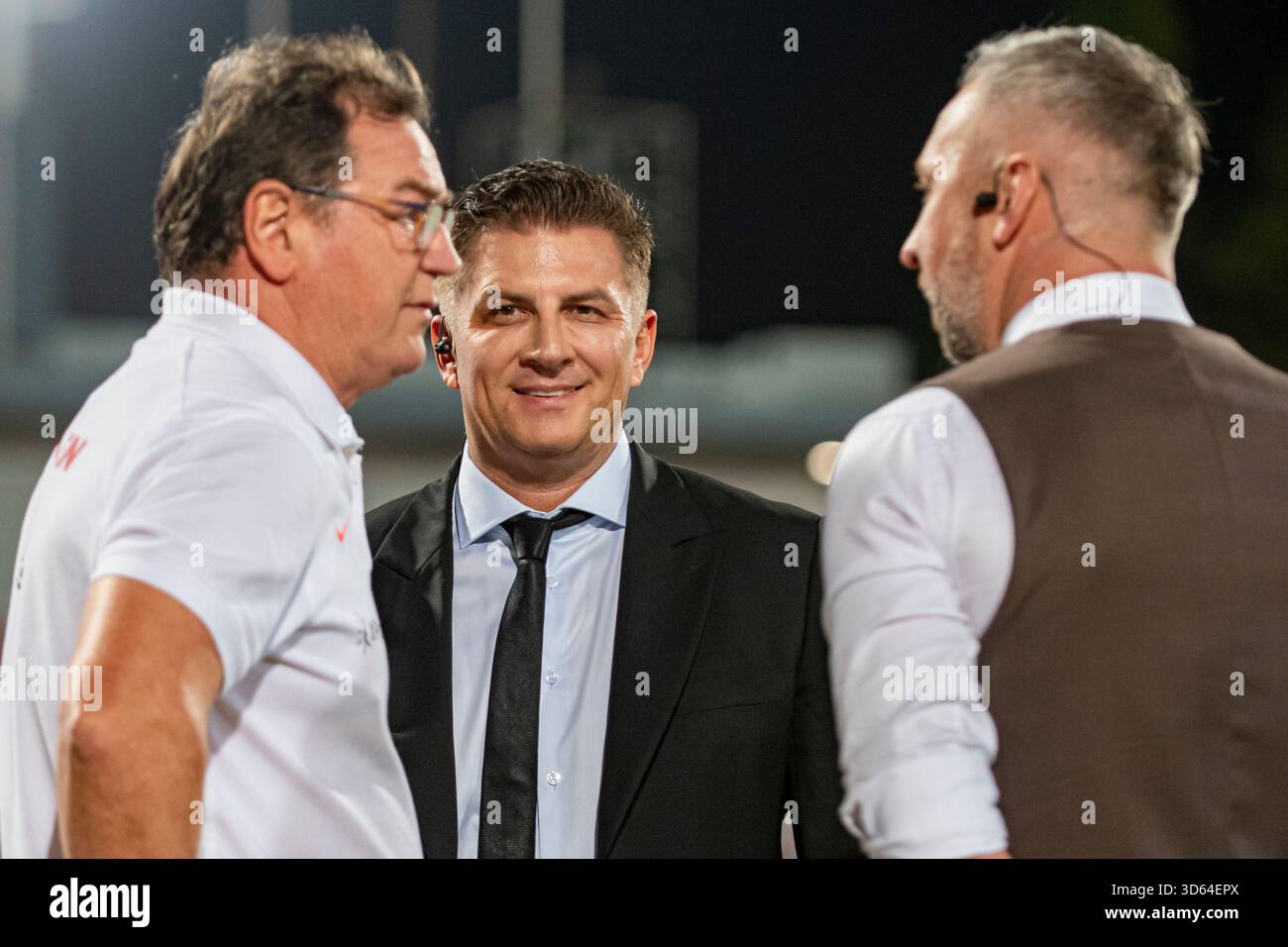 Polish TV commentator Mateusz Borek taklks with Coach Jan Urban of ...