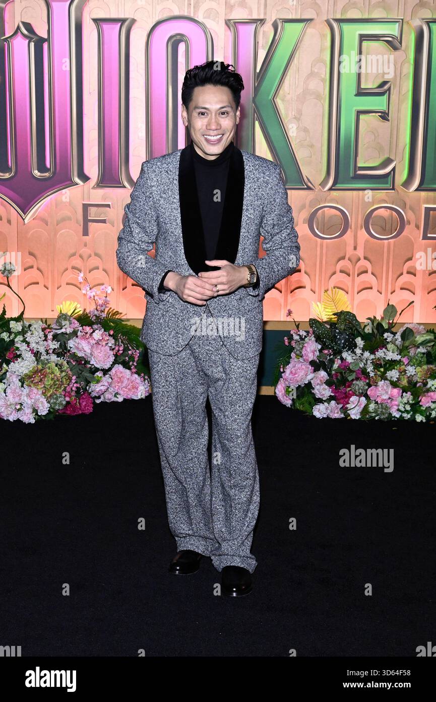 Director Jon M. Chu walking the red carpet at 'Wicked: For Good!' New ...