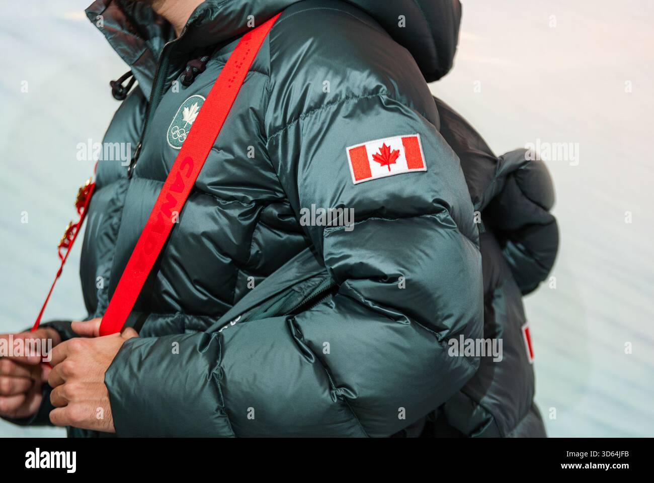 An athlete models Lululemon's new Team Canada uniforms for the 2026 ...