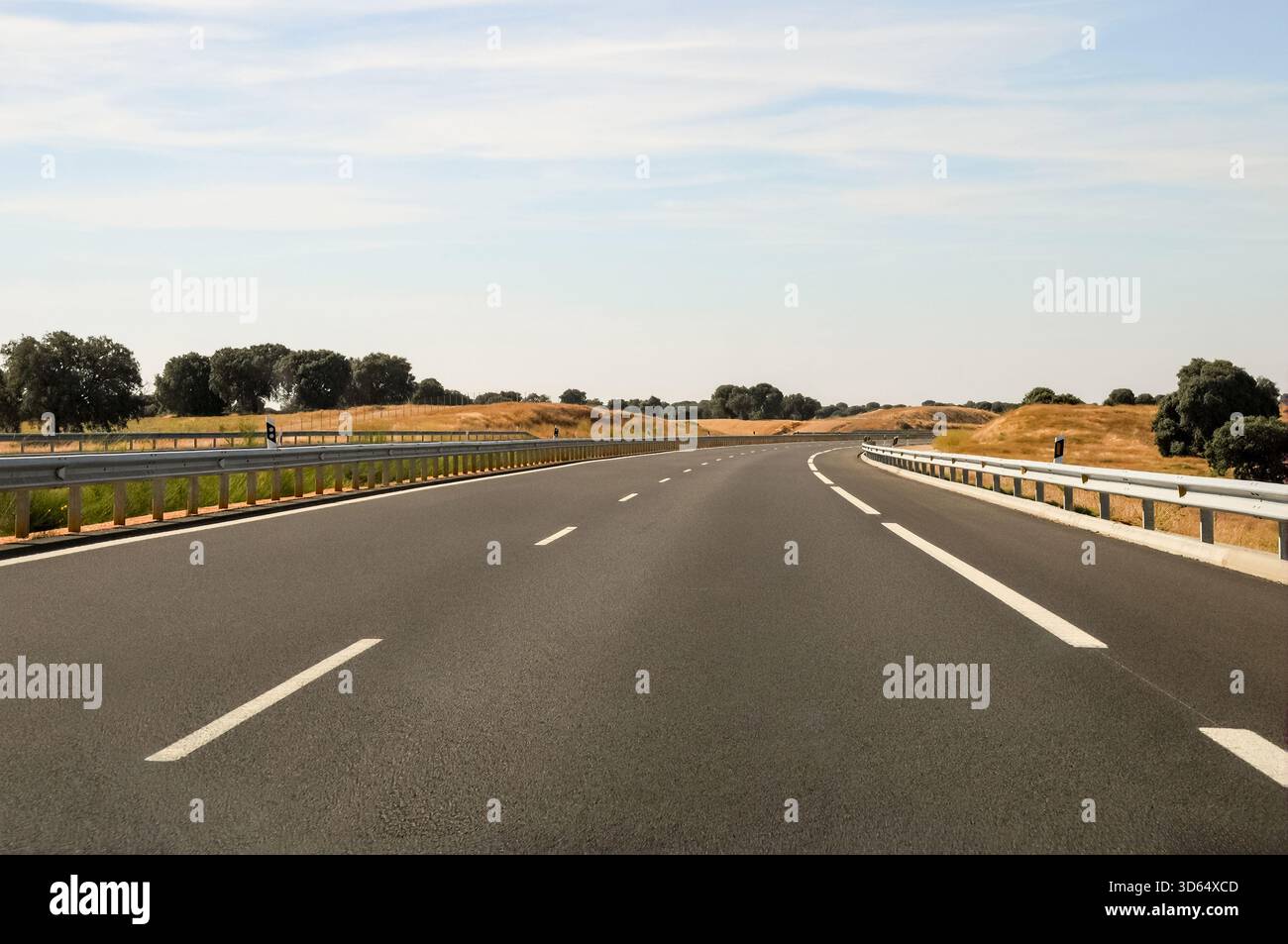 Empty road with a curve to the right, image captured in motion Stock ...