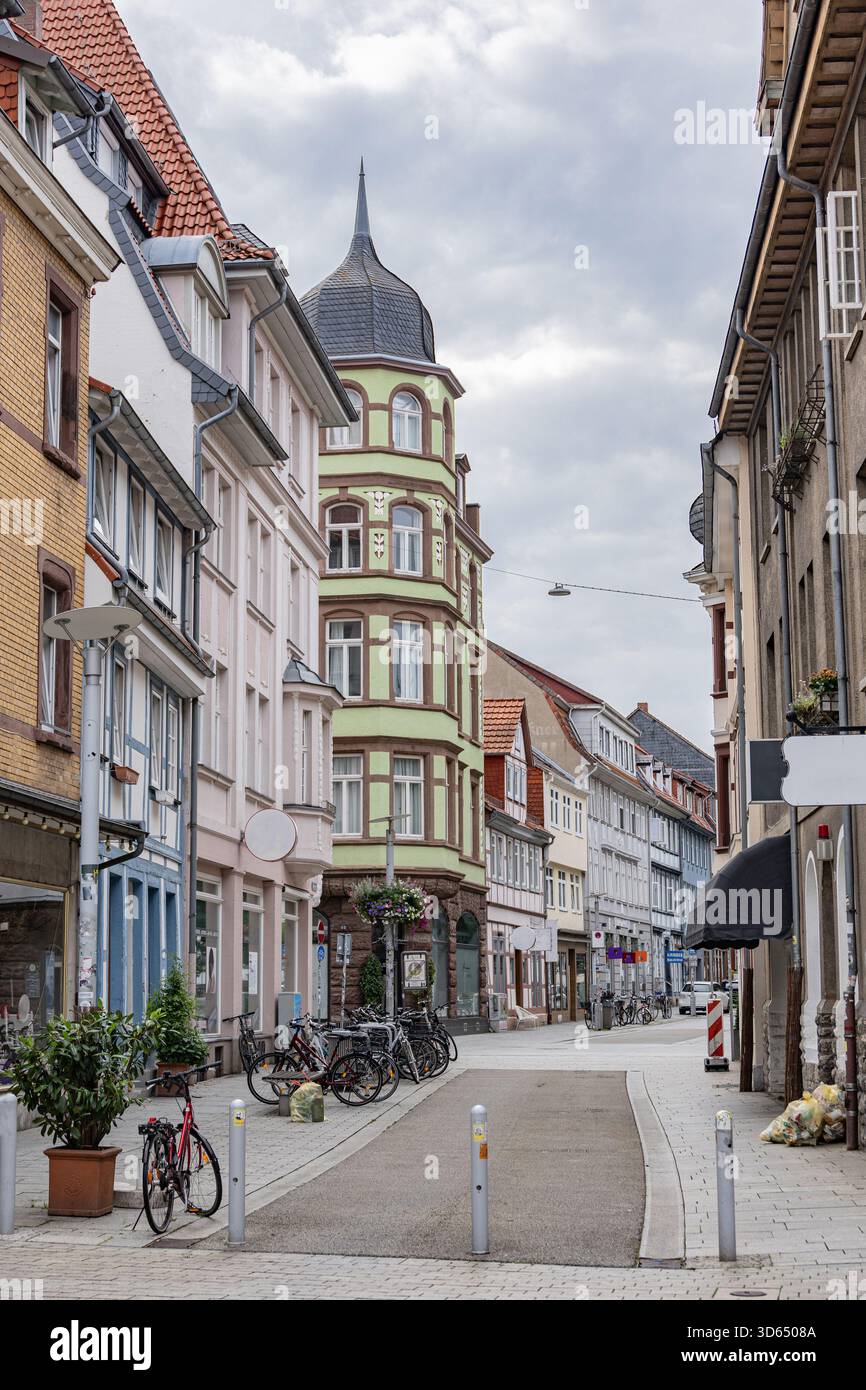 Historic European street with colorful traditional buildings, bicycles ...