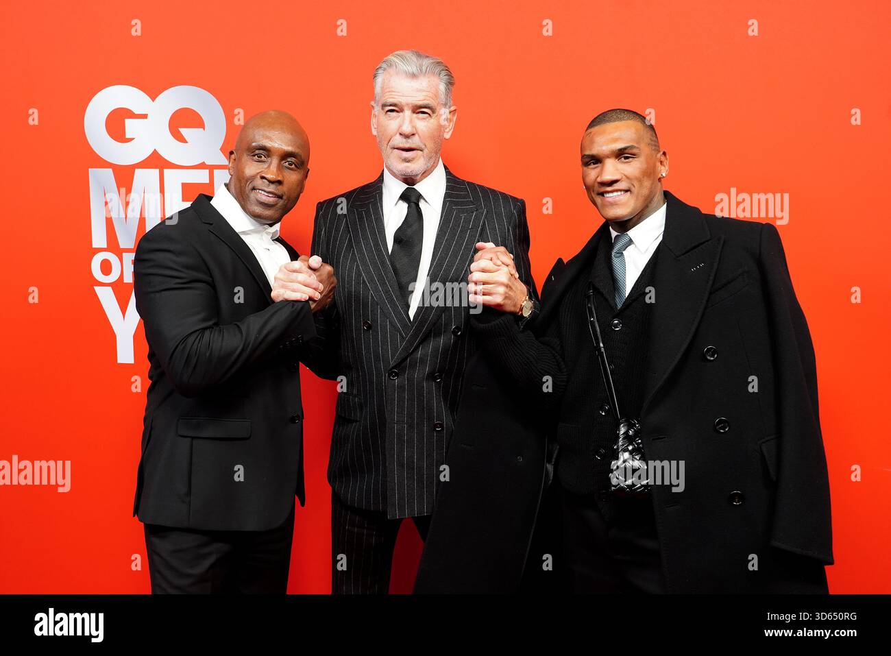 Pierce Brosnan, Nigel Benn and Conor Benn attend the GQ Men of the Year ...