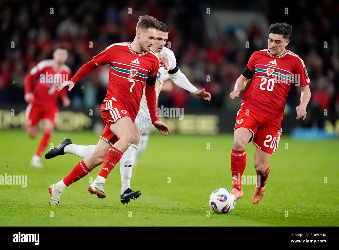 Wales' David Brooks (left) gets past North Macedonia's Andrej ...