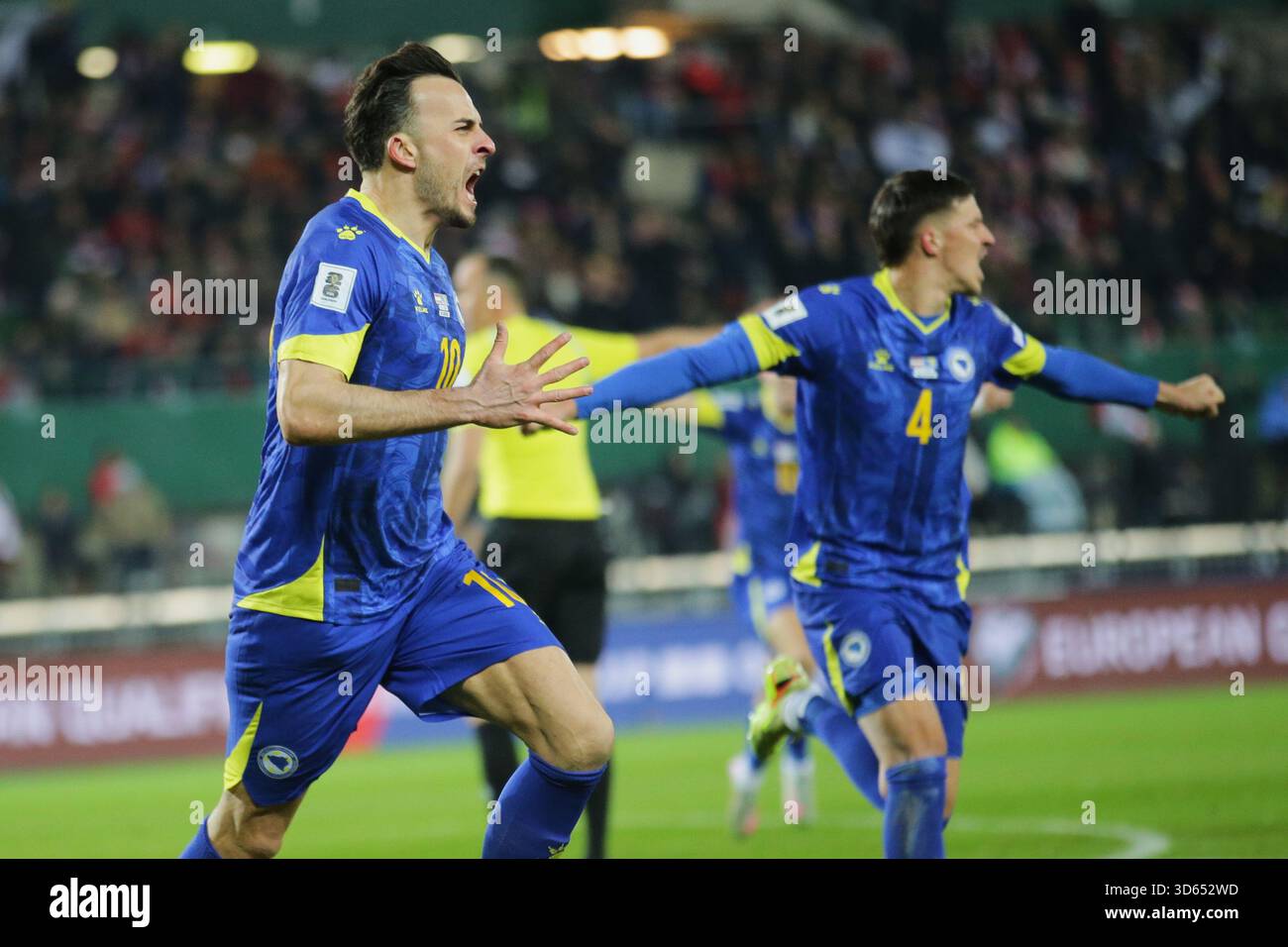 Bosnia and Herzegovina's Haris Tabakovic, left, celebrates his side's ...