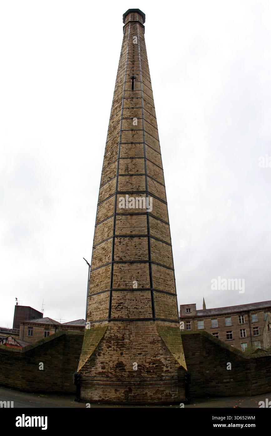 Tall brick factory chimney with metal bracing. Nestle factory, Halifax ...