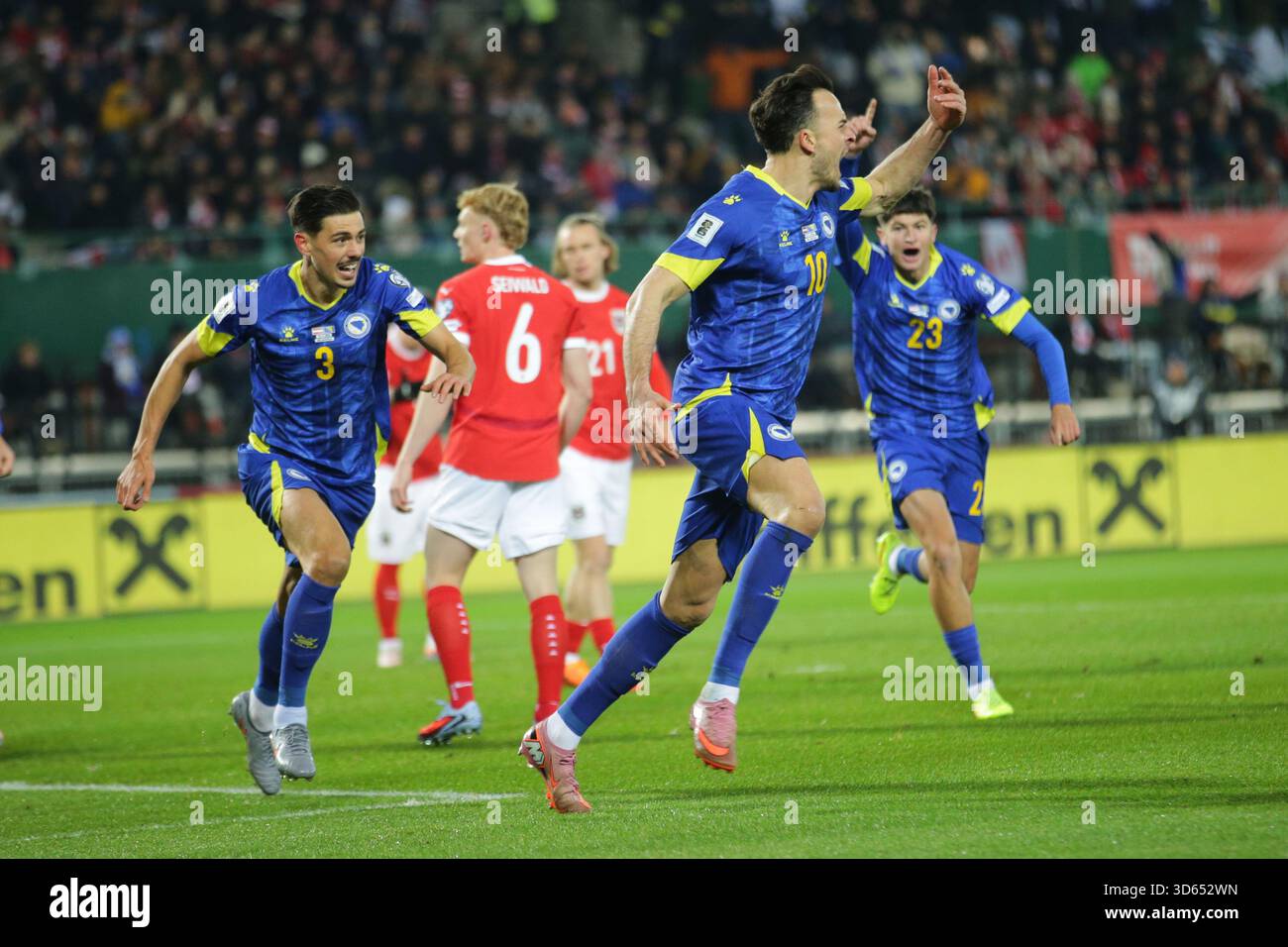 Bosnia and Herzegovina's Haris Tabakovic, right, celebrates his side's ...