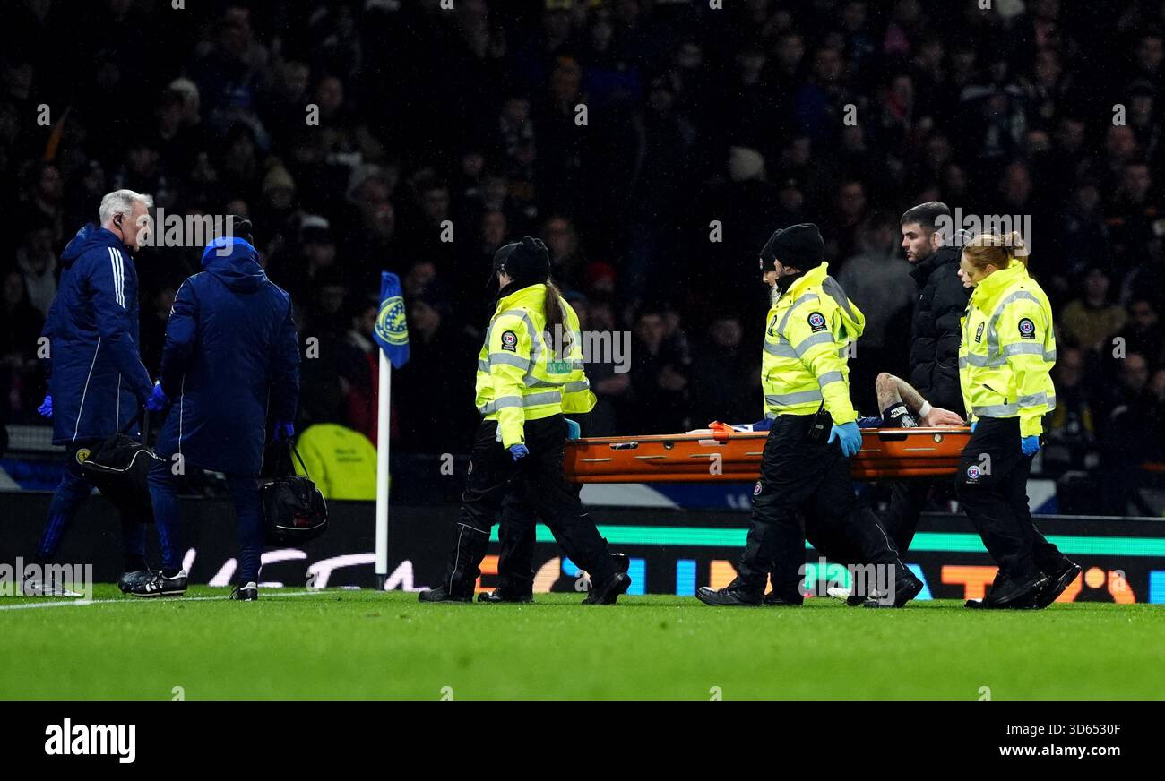 Scotland's Ben Gannon-Doak is carried off injured during the FIFA World ...
