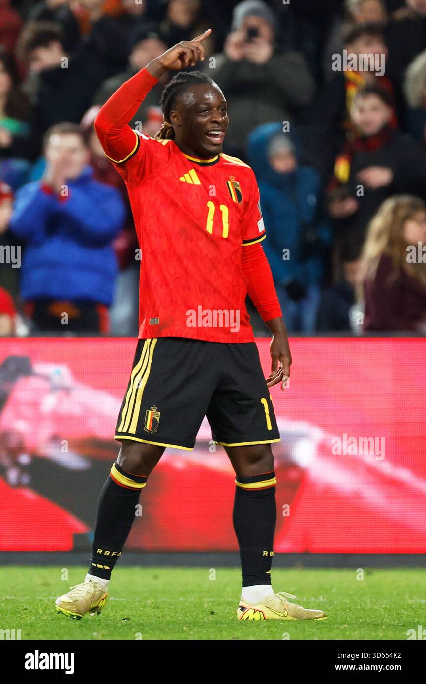 Belgium's Jeremy Doku celebrates after scoring his sides third goal ...