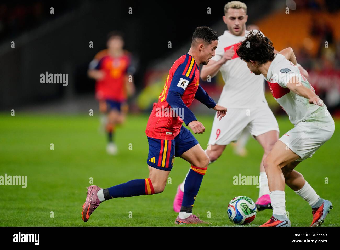 Spain's Yeremy Pino fights for the ball against Turkey's Ferdi Kadıoğlu ...